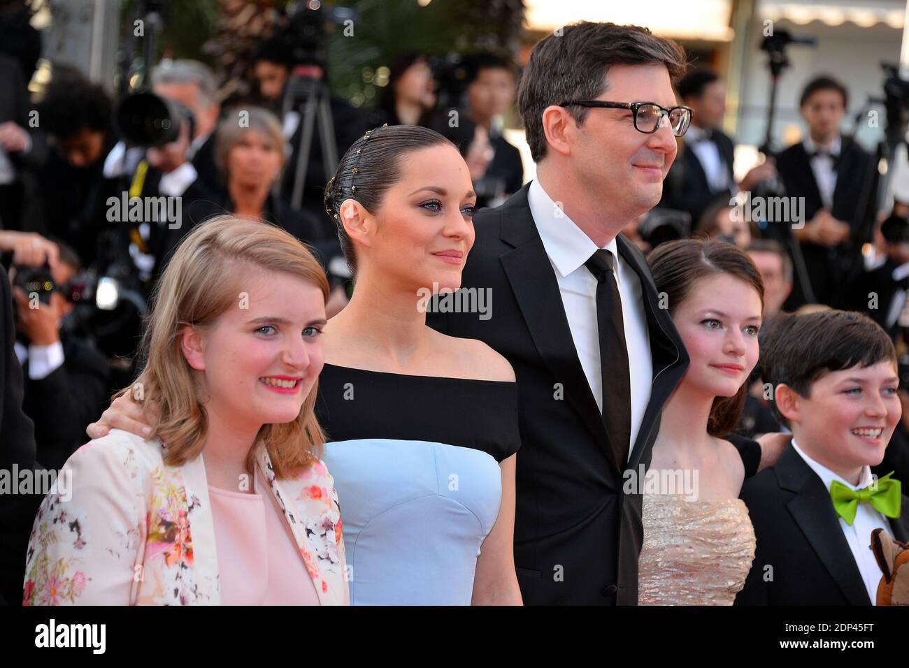 Riley Osborne, Mackenzie Foy, Mark Osborne, Marion Cotillard arriving ...
