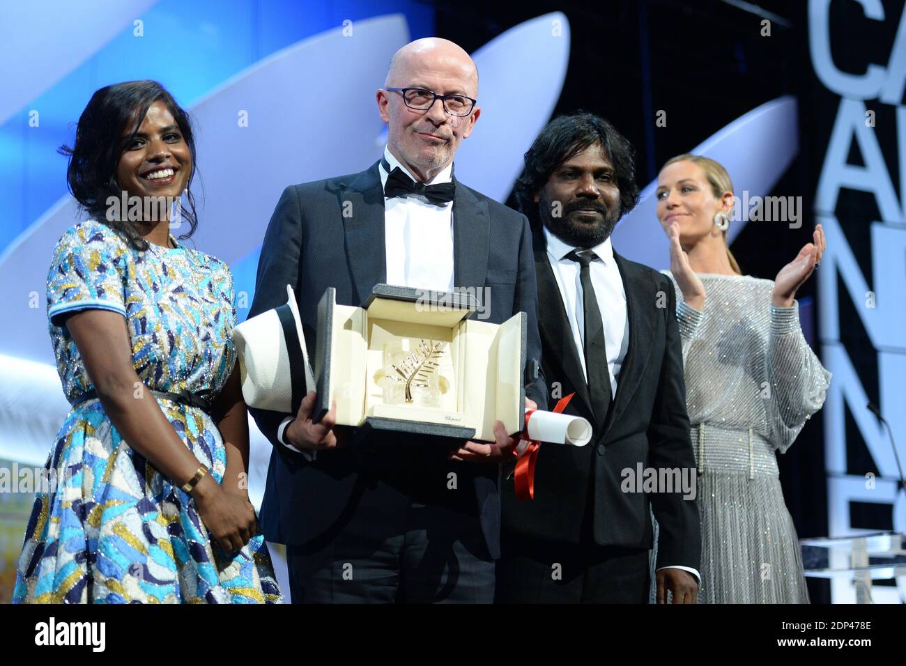 Director Jacques Audiart poses with The Palm d'Or for his film 'Dheepan ...