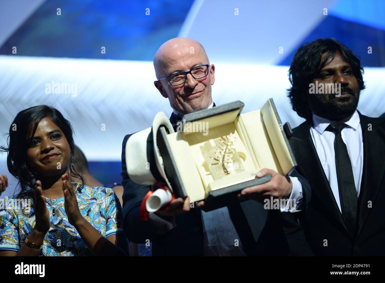 Director Jacques Audiart poses with The Palm d'Or for his film 'Dheepan ...