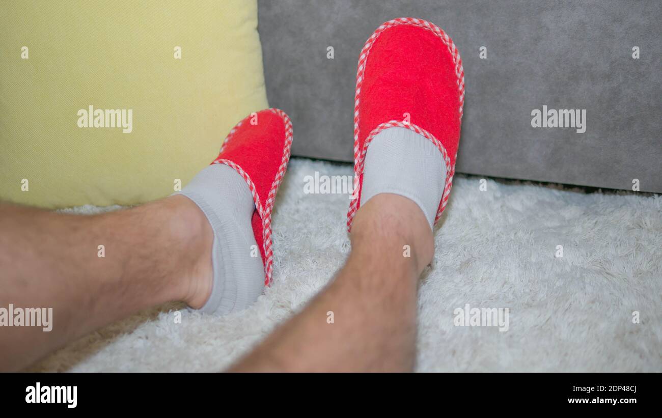 Man sofa slippers hi-res stock photography and images - Alamy