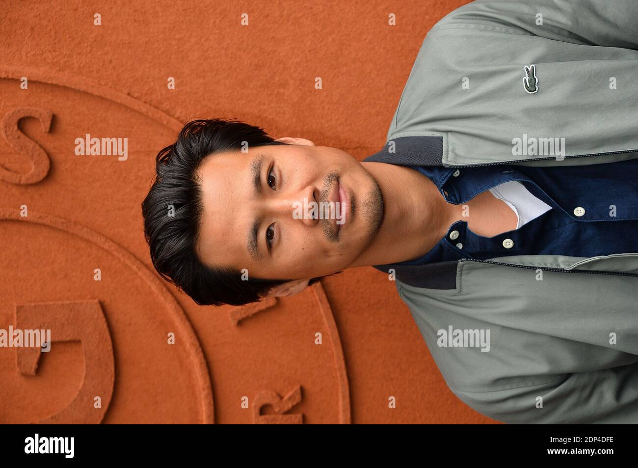 Frederic Chau posing at the Village during French Tennis Open at Roland ...