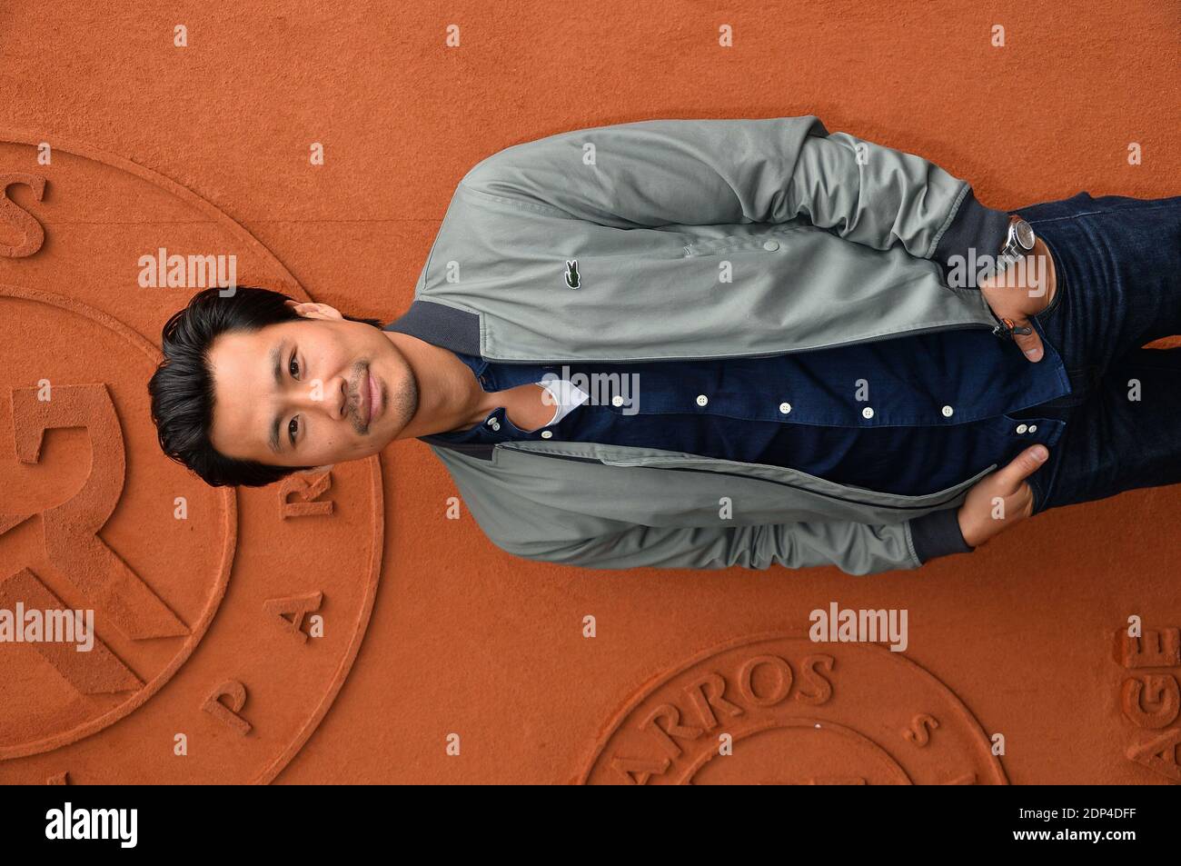 Frederic Chau posing at the Village during French Tennis Open at Roland ...