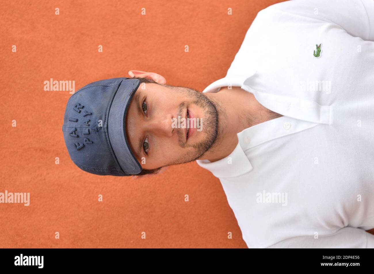 Hugo Becker posing at the Village during French Tennis Open at Roland ...
