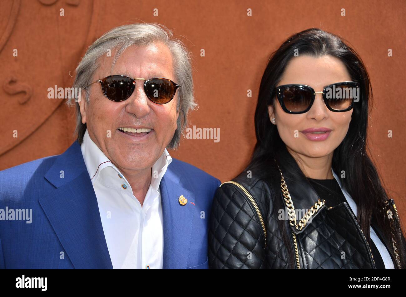 Ilie Nastase, Brigitte Nastase posing at the Village during French ...