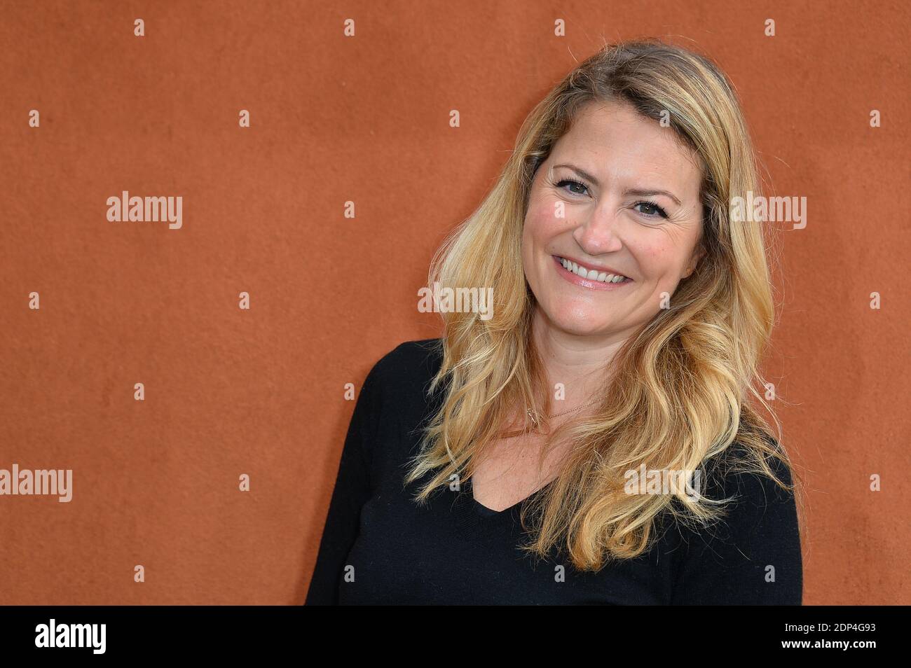 Astrid Bard posing at the Village during French Tennis Open at Roland ...
