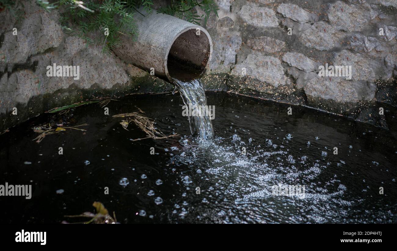 Waste water,mud flows from the pipe into the river,environmental ...
