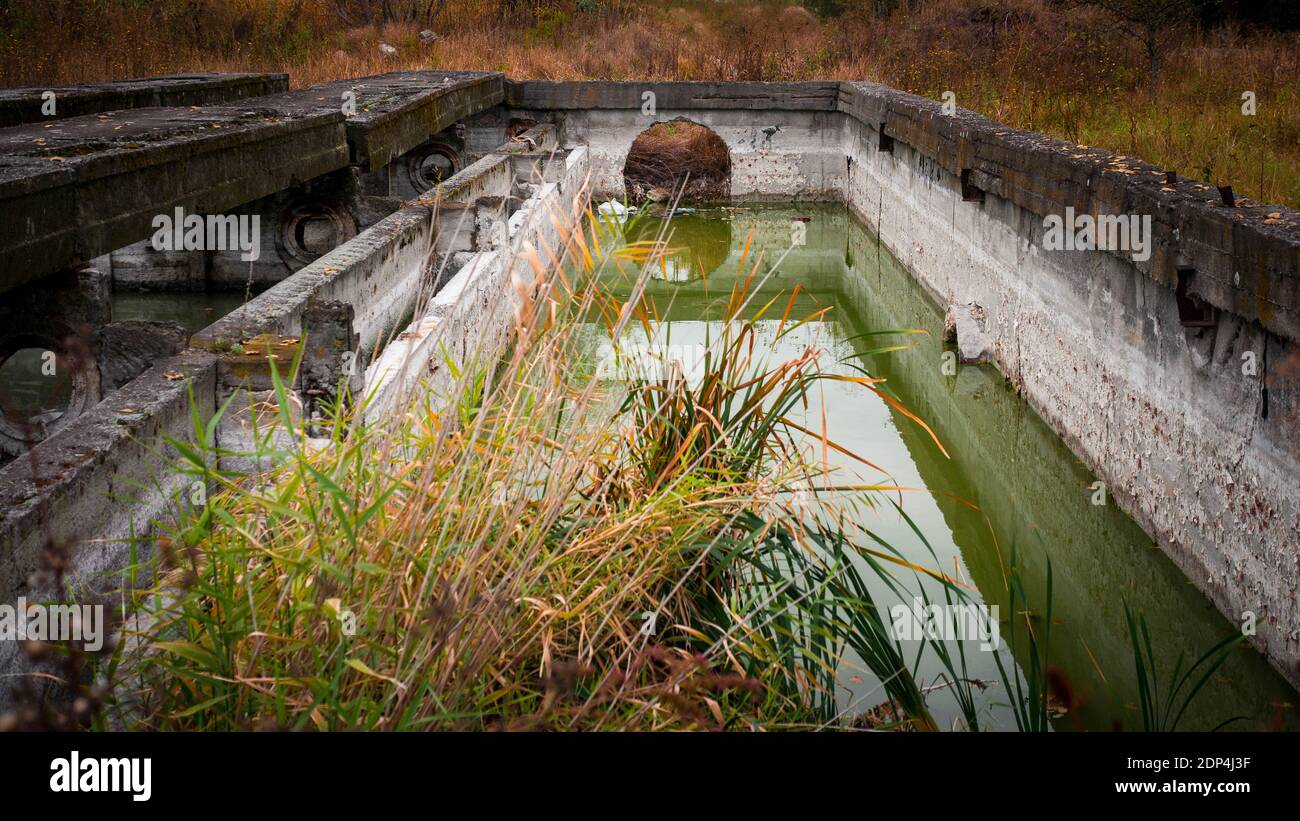 Wastewater,destroyed building,concrete slabs in the water.Environmental ...