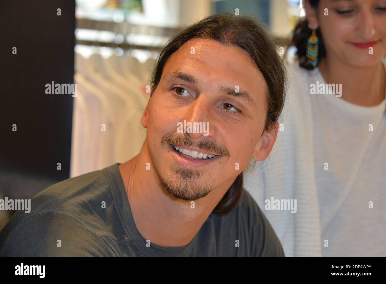 Zlatan Ibrahimovic signs autographs for his fan at Colette store for ...