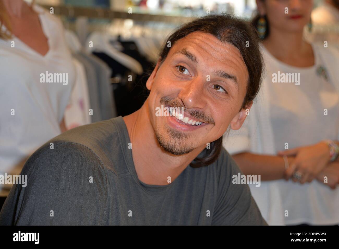 Zlatan Ibrahimovic signs autographs for his fan at Colette store for ...