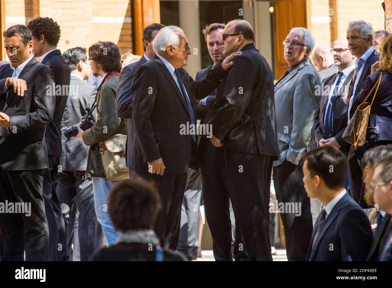 Dominique Strauss-Kahn, Julien Dray attending the funeral of Emmanuel ...