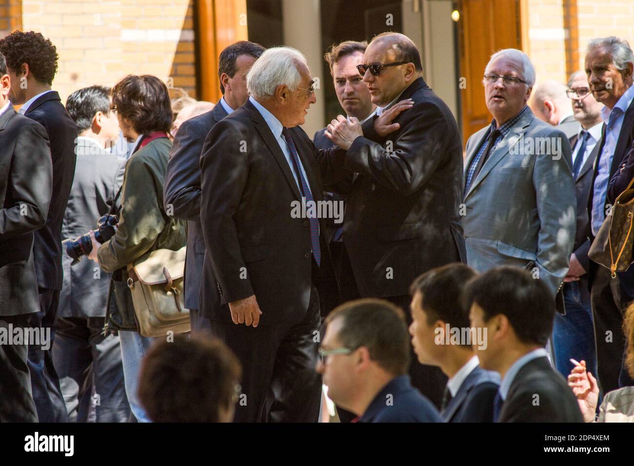 Dominique Strauss-Kahn, Julien Dray attending the funeral of Emmanuel ...