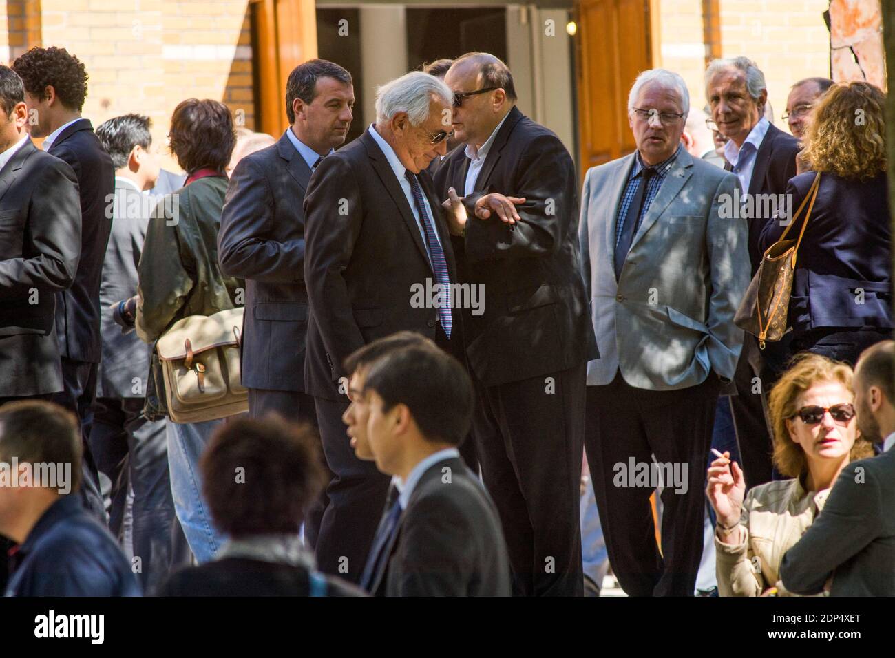Dominique Strauss-Kahn, Julien Dray attending the funeral of Emmanuel ...
