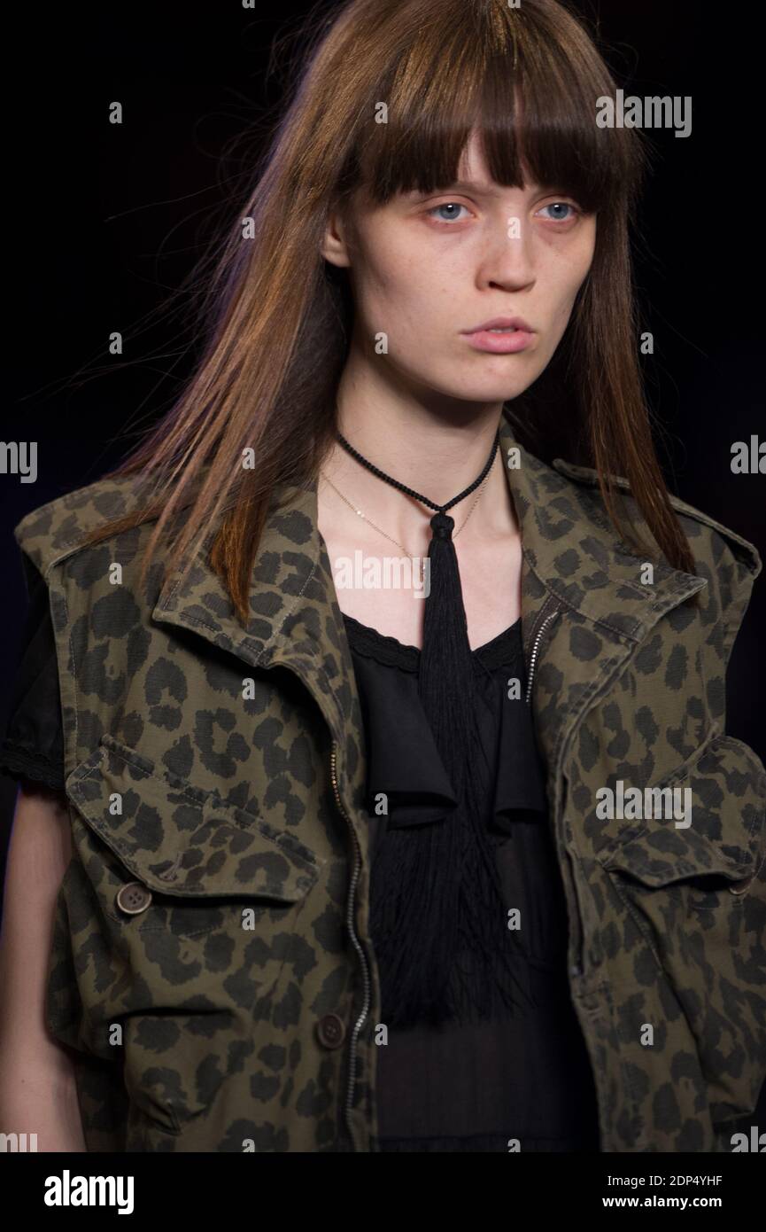 A model displays a creation for Yves Saint-Laurent Spring - Summer 2016 ...