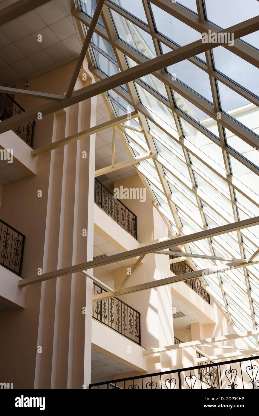 New modern construction with big sloping window. Architecture concept ...