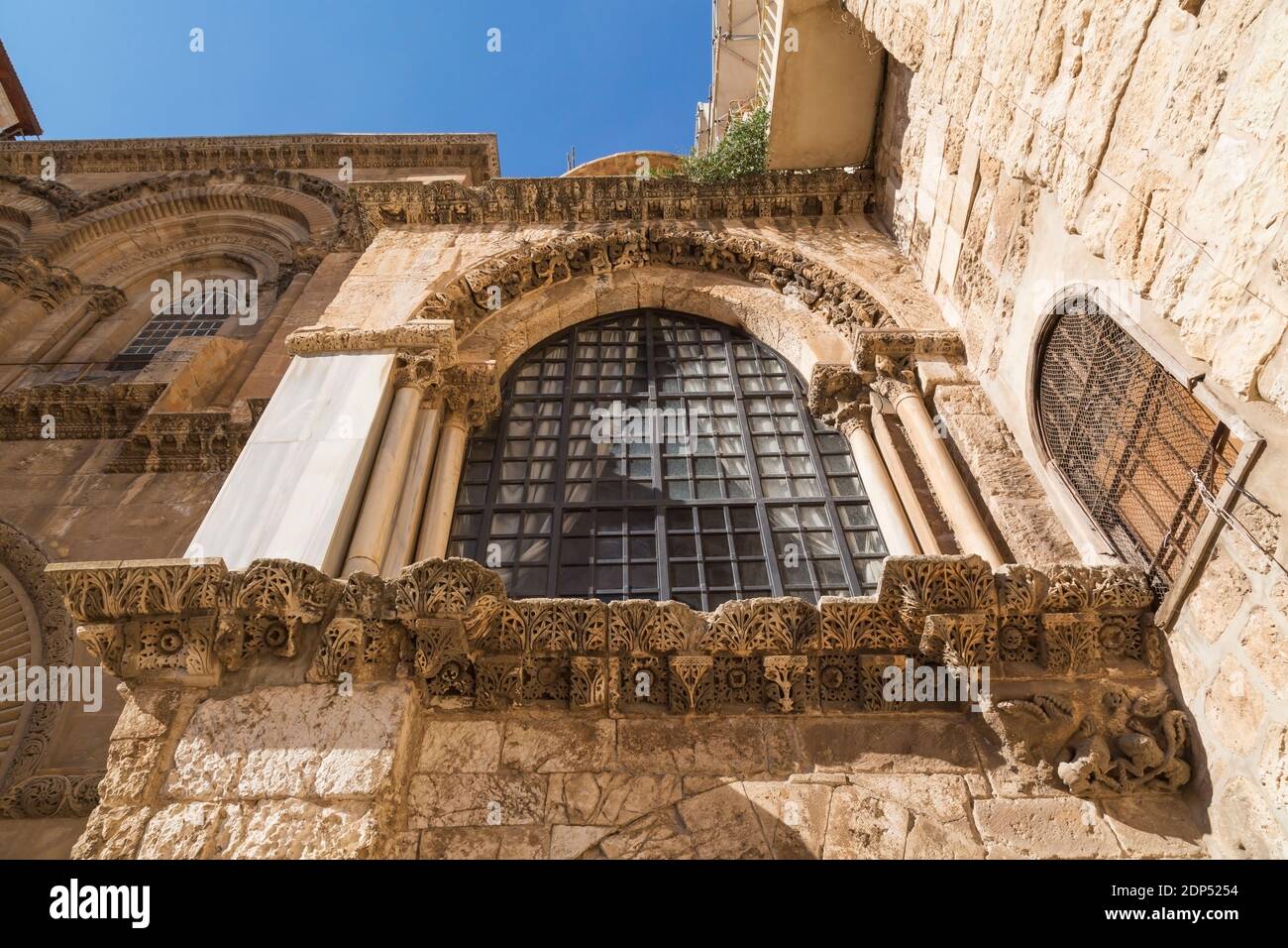 Arched window details on exterior wall of the Holy Sepulcher Church ...