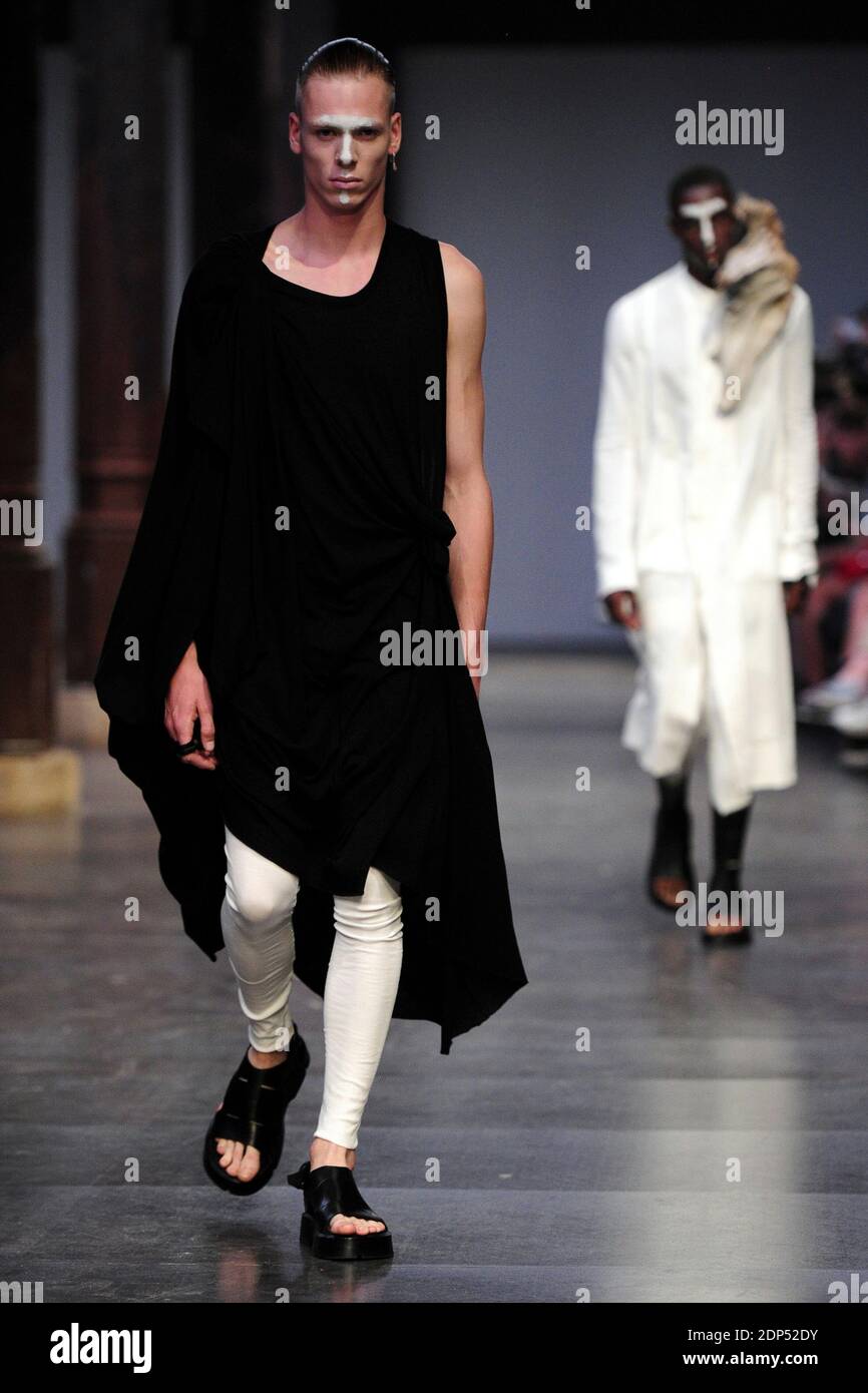 A model walks the runway at the Julius Spring-Summer 2016 fashion show ...