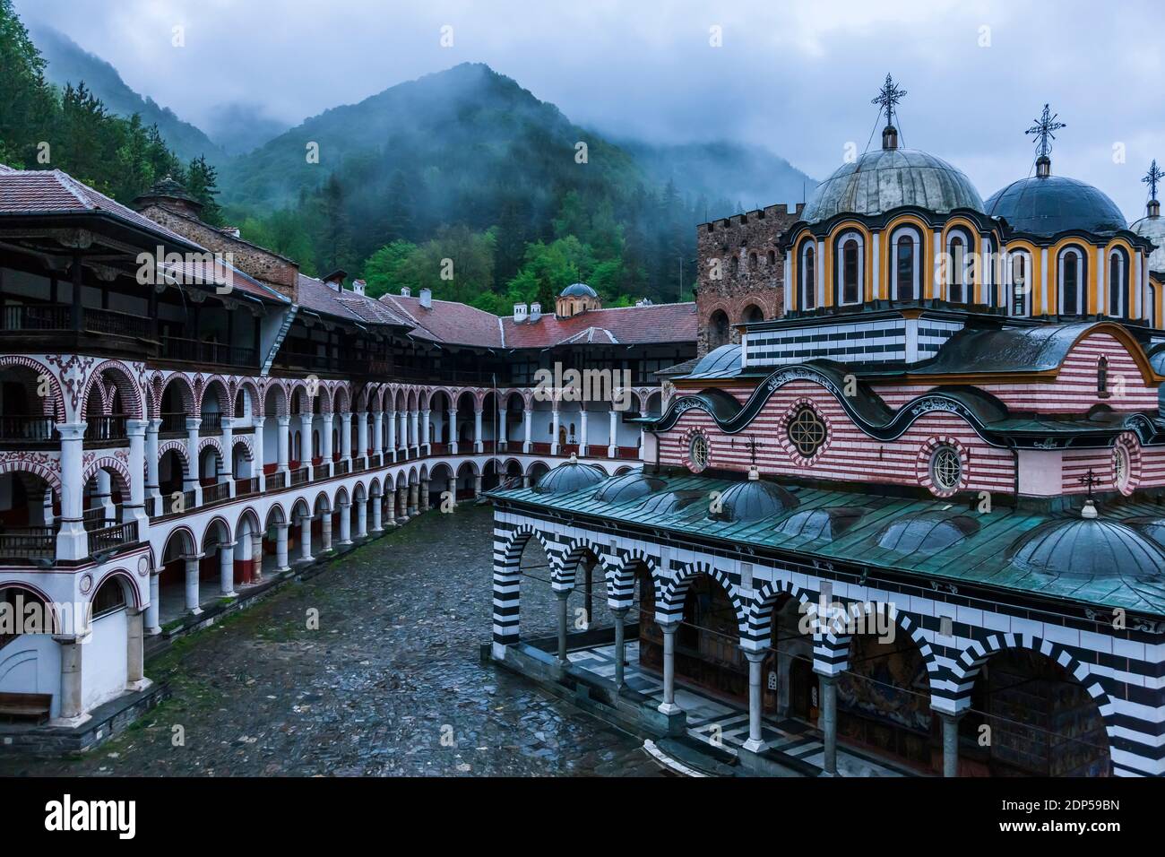 Rila Monastery in the rain, Monastery of Saint Ivan of Rila, courtyard ...