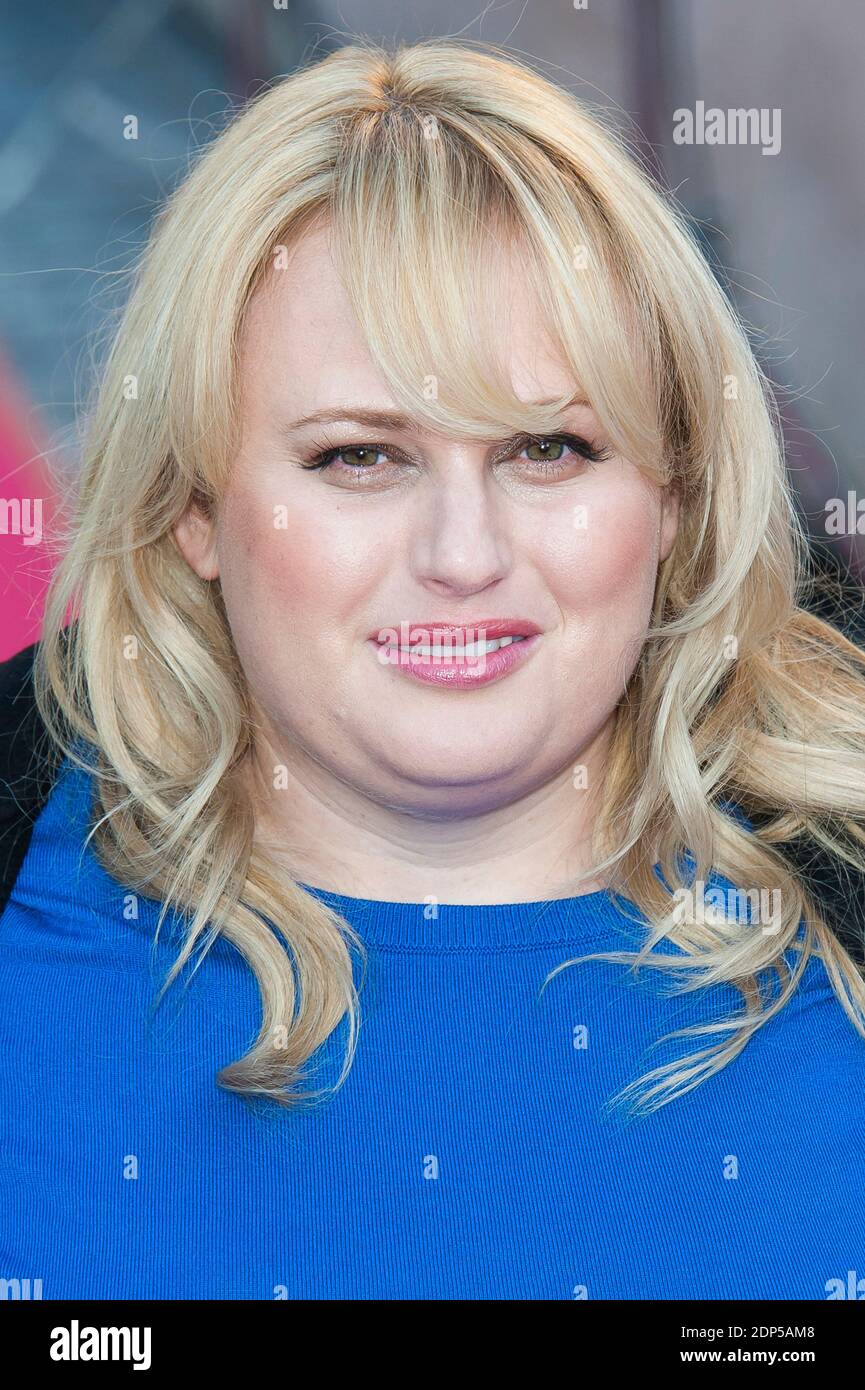 Rebel Wilson poses for pictures as she arrives to the premiere of the ...