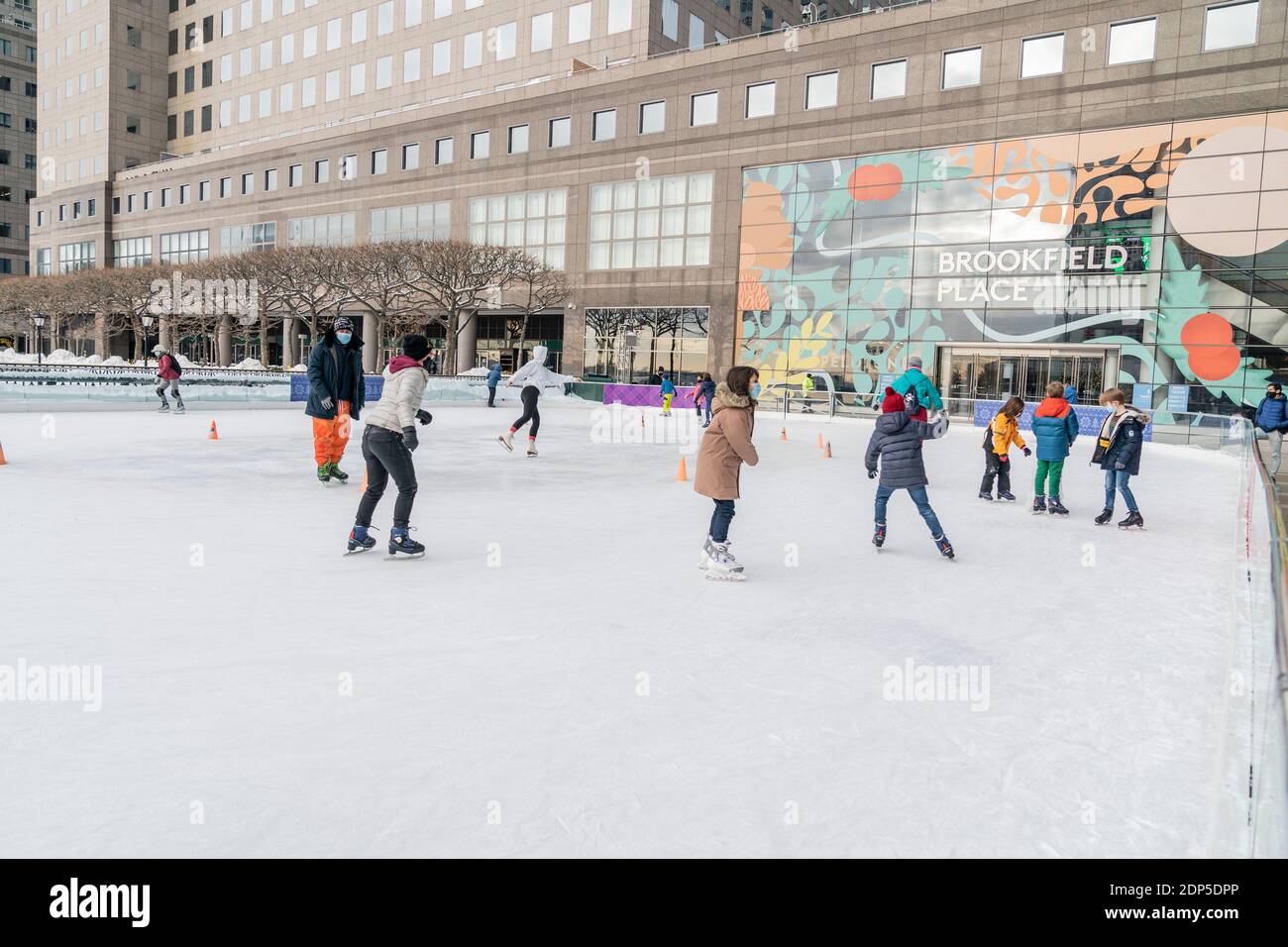 New York, NY - December 18, 2020: People of all ages enjoy skating on ...