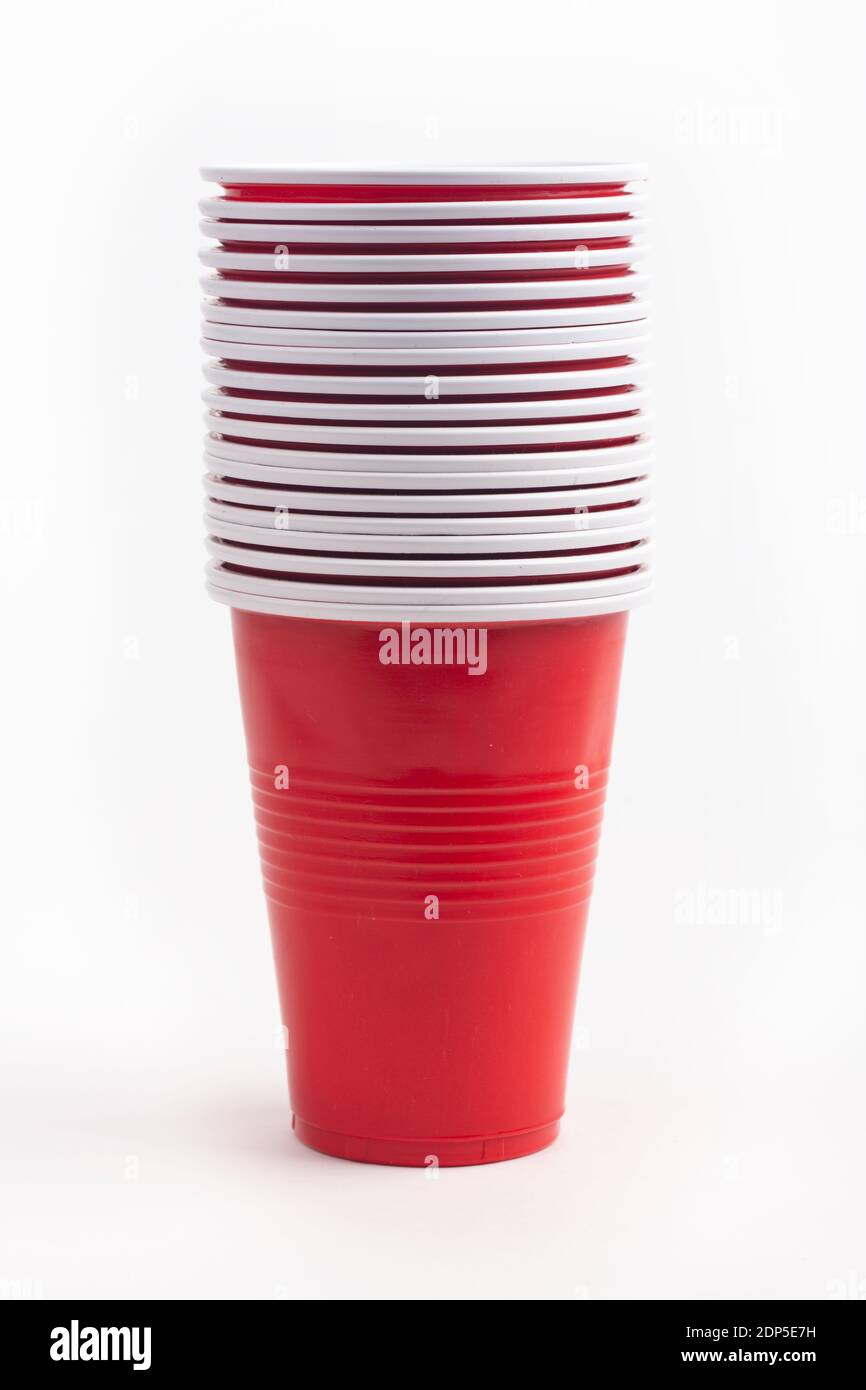 Stacked Red plastic cups isolated over white background Stock Photo - Alamy