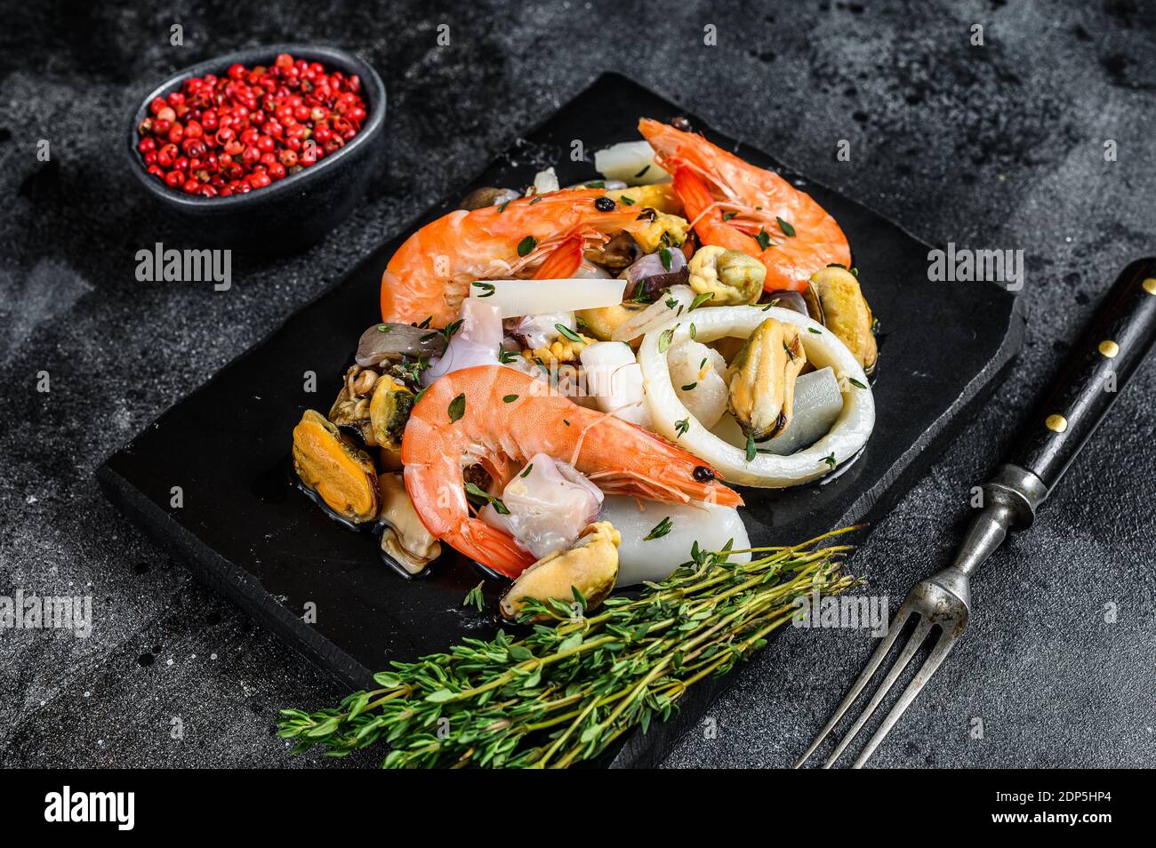 Fresh mix seafood cocktail with shrimps, prawns, mussels, squids and ...