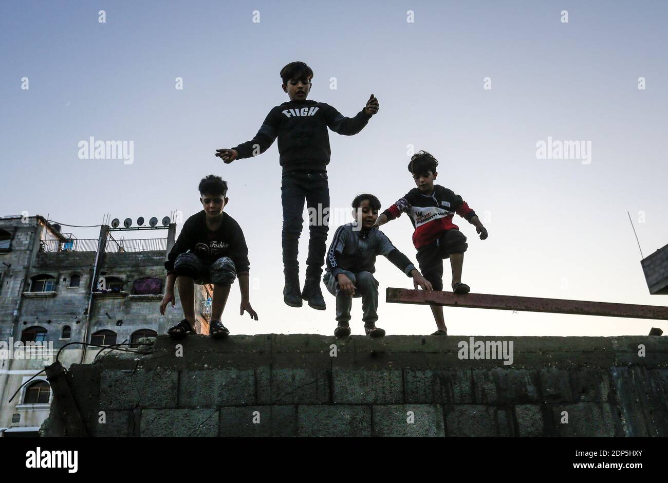Palestinian children play outside their home in Jabalia camp in the ...