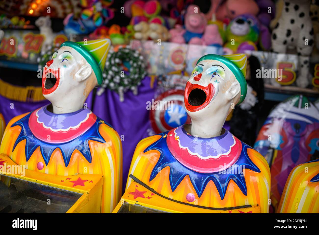 A row of laughing clown faces turning from side to side Stock Photo - Alamy