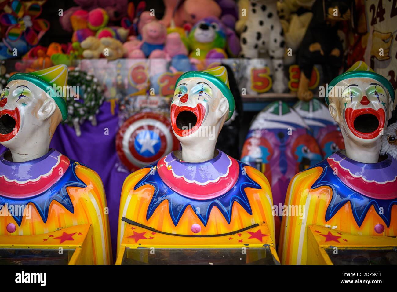 A row of laughing clown faces turning from side to side Stock Photo - Alamy