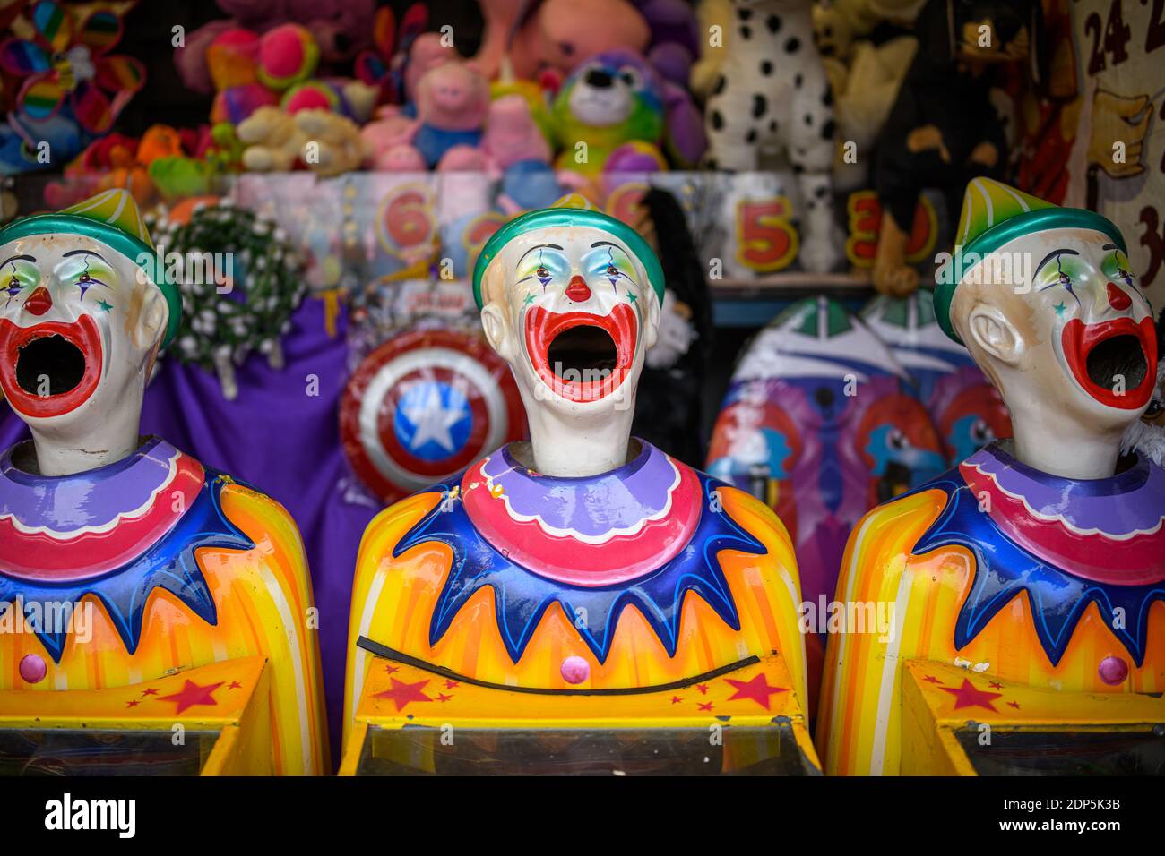 A row of laughing clown faces turning from side to side Stock Photo - Alamy