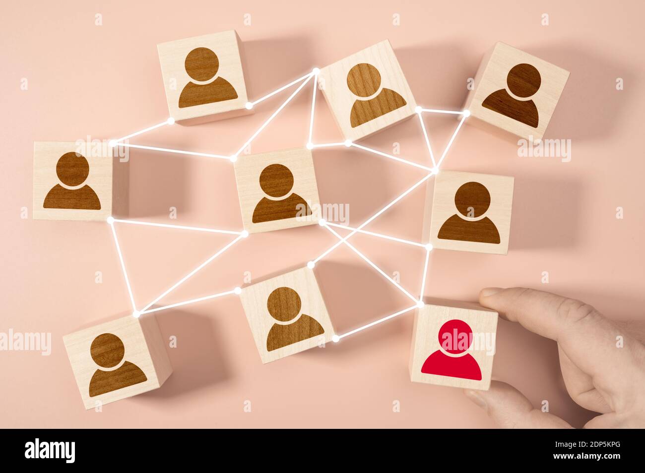 Building a strong team, Wooden blocks with employee icon on pastel ...