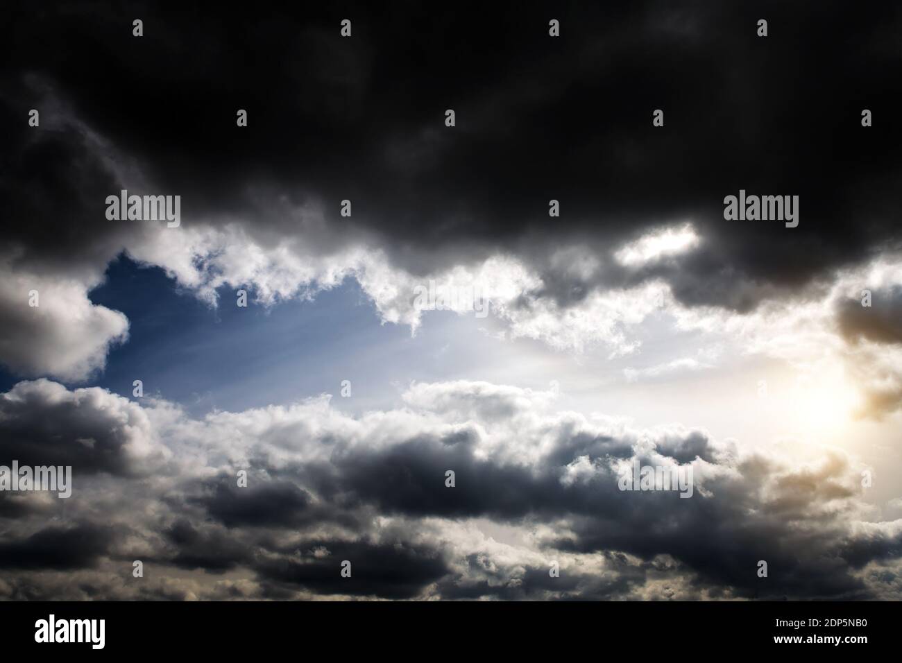 Light in the Dark and Dramatic Storm Clouds Stock Photo - Alamy