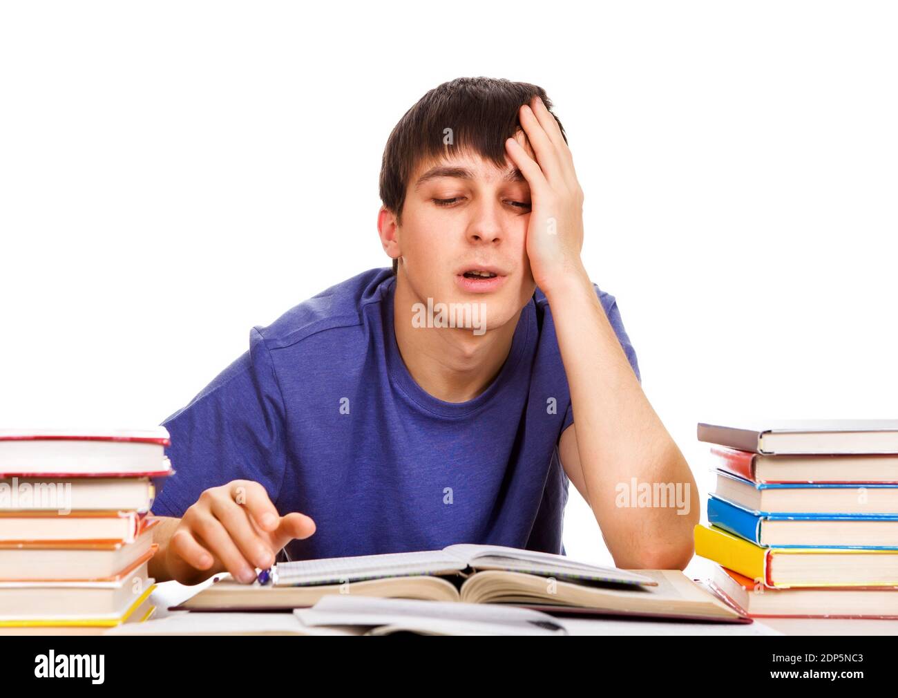 Tired and Troubled Student at the Writing Table on the White Background ...