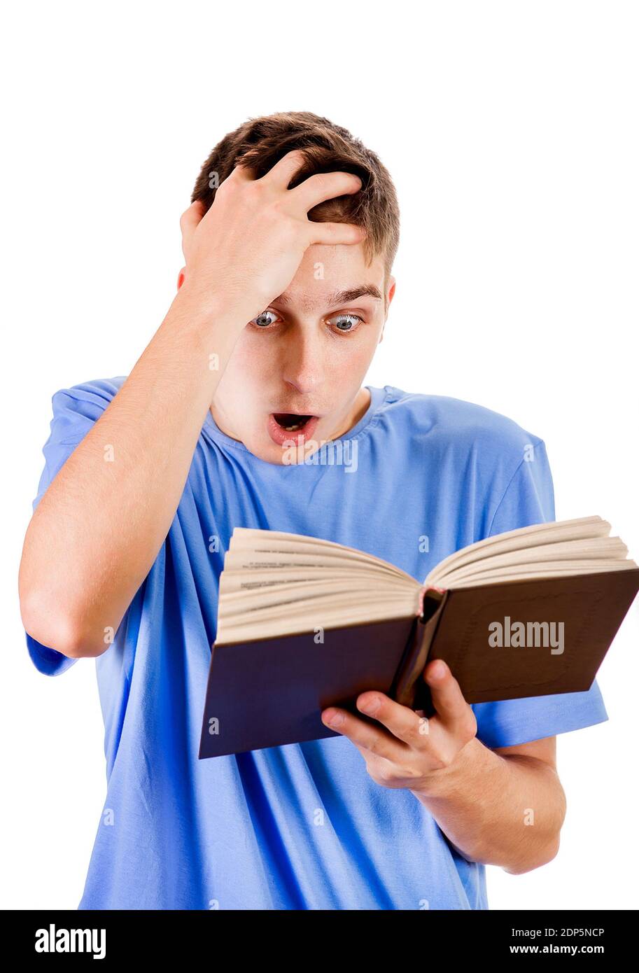 Surprised Young Man read a Book Isolated on the White Background Stock ...