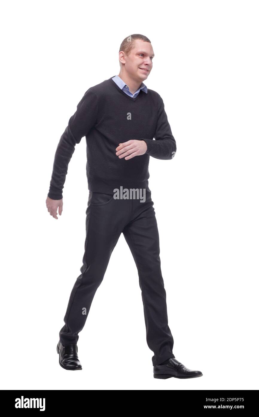 Casual Man is walking towards the camera on white background Stock ...