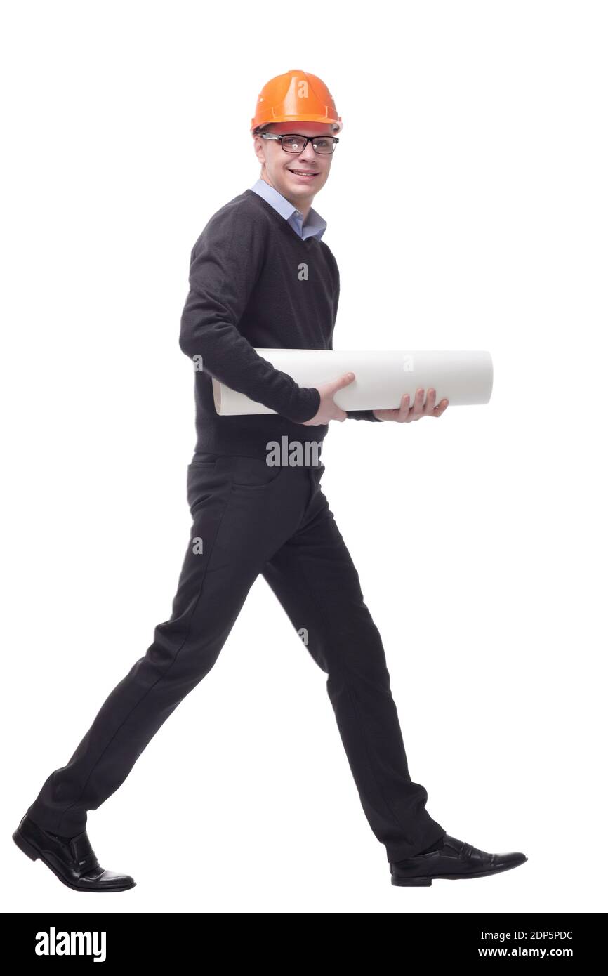 Side view of an male architect carrying blueprints, isolated on white ...