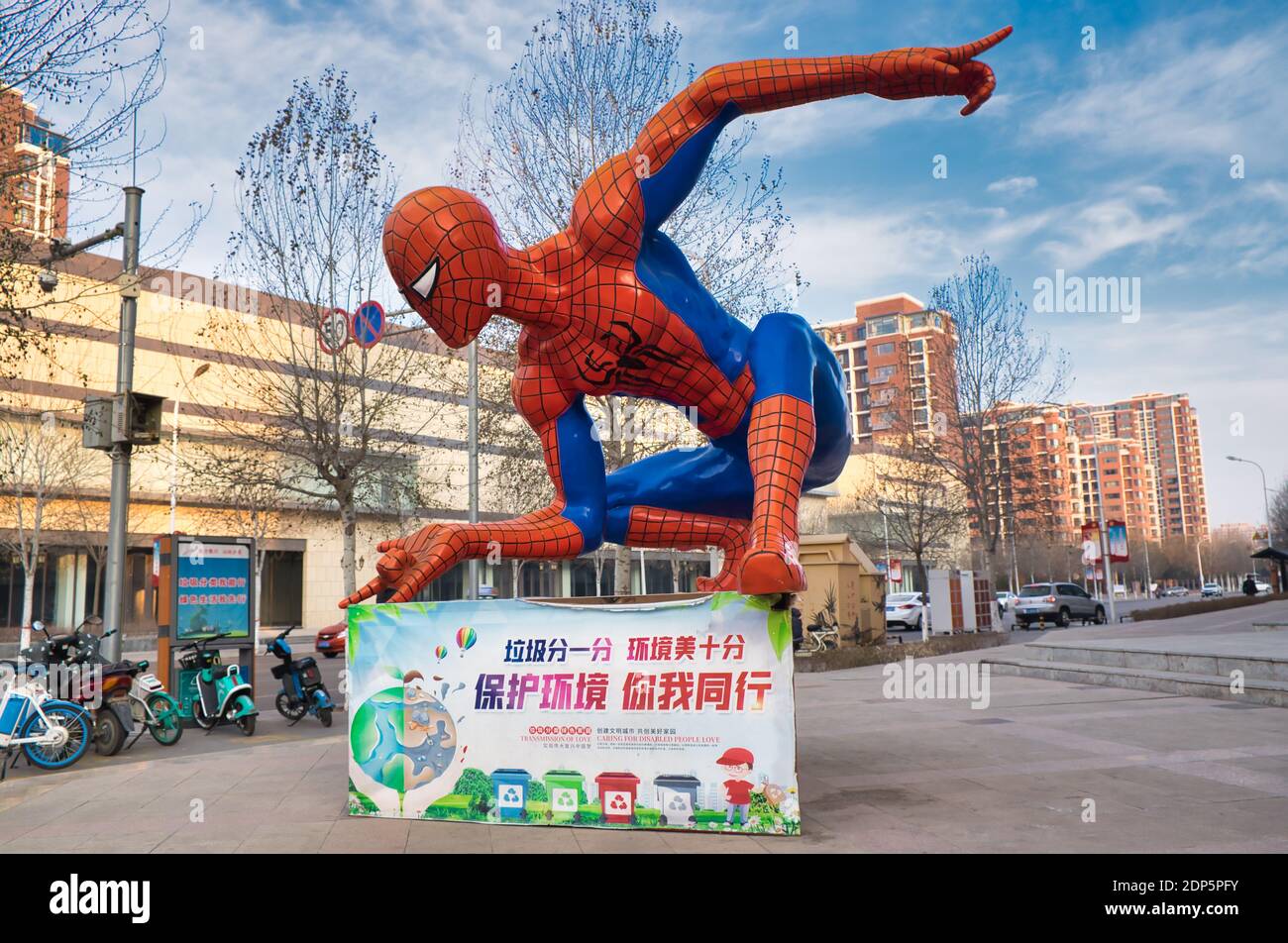 spiderman statue on a junction Stock Photo - Alamy