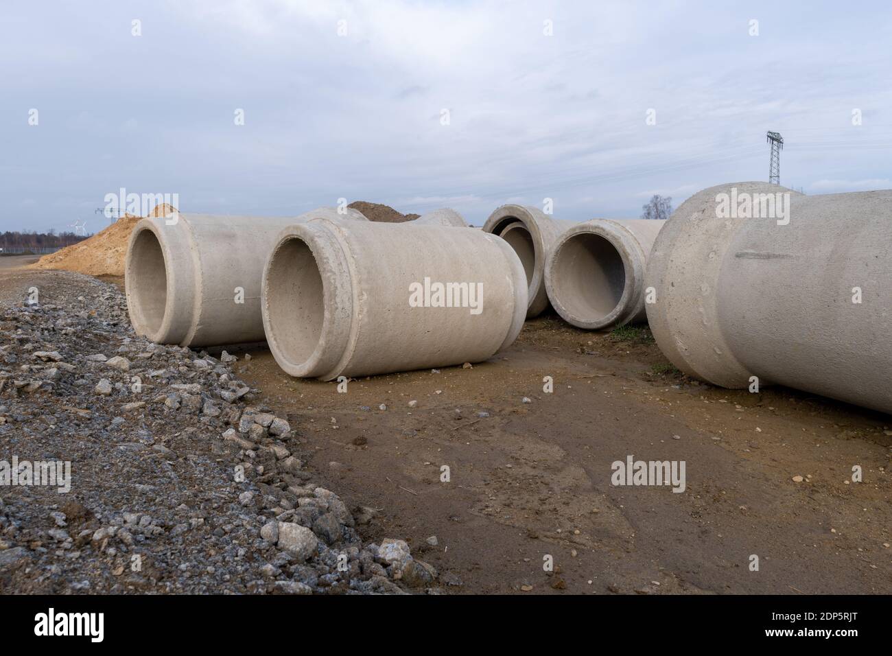 Sewer material for the construction of a road Stock Photo - Alamy