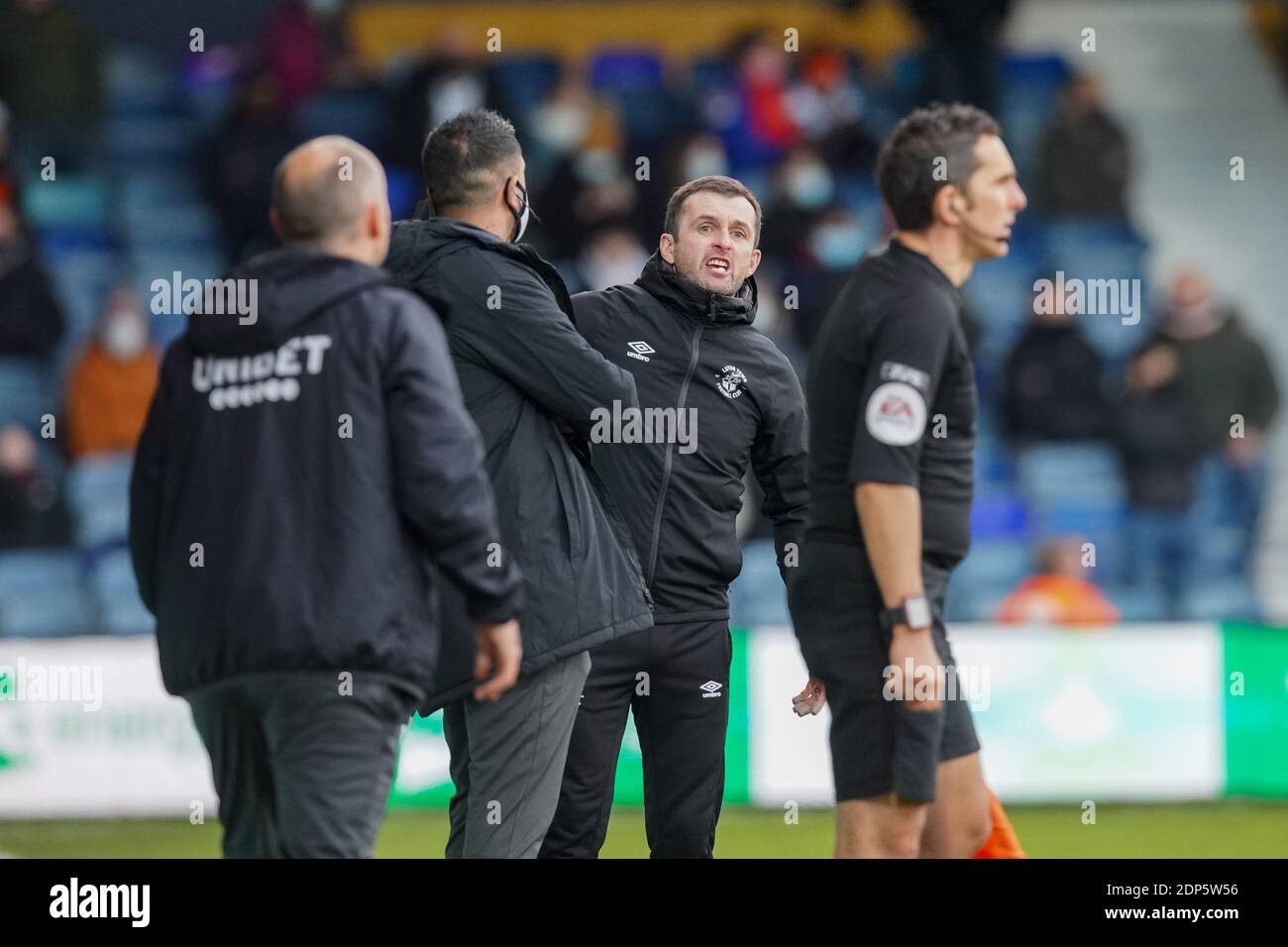 Nathan Jones manager of Luton Town makes his point to the fourth ...