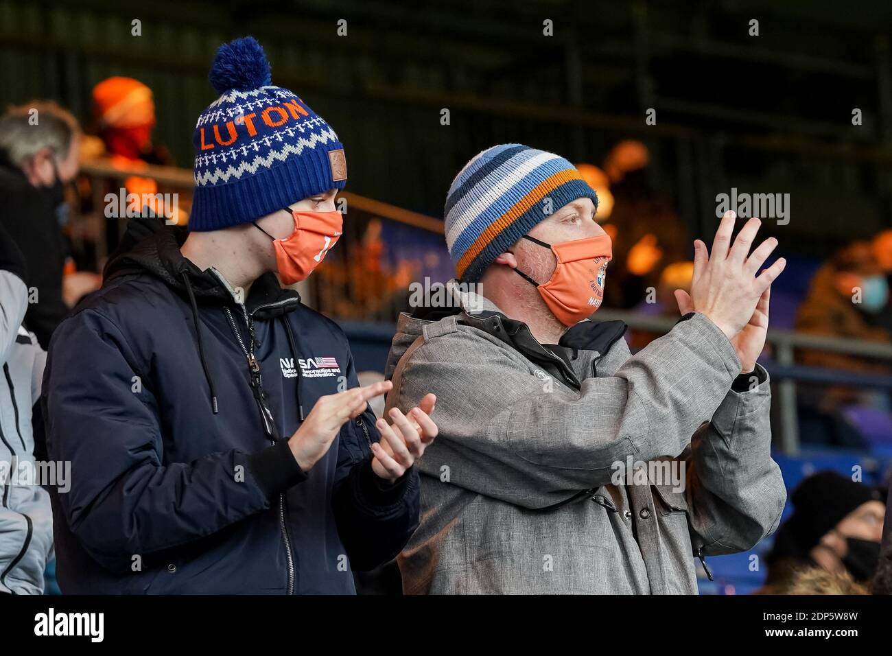 Luton Town fans happy to be back watching their team Stock Photo - Alamy