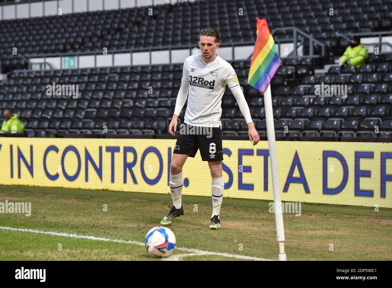 Max Bird #8 of Derby County prepares the corner by a rainbow flag Stock ...