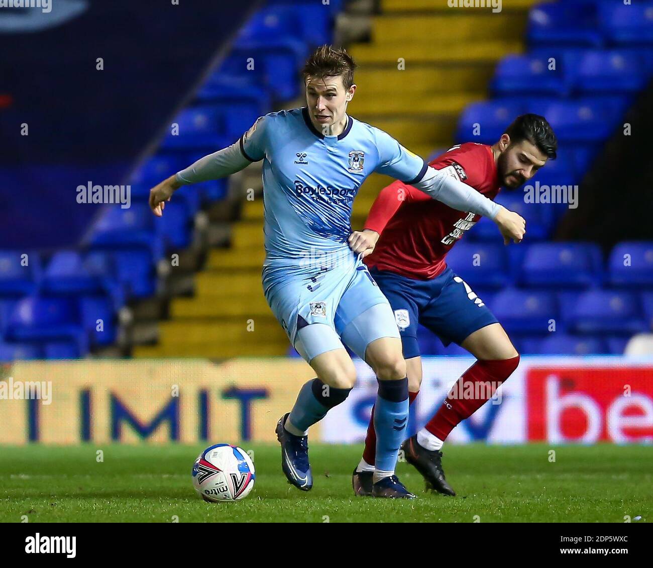 Ben Sheaf #14 of Coventry City holds off Pipa #2 of Huddersfield Town ...