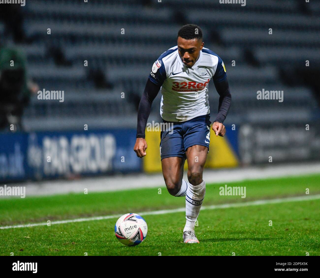 Darnell Fisher #2 of Preston North End runs down the wing with the ball ...