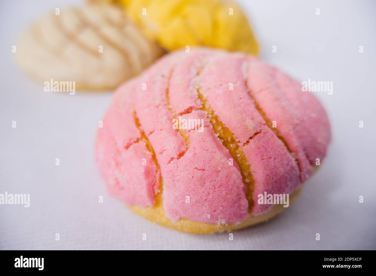 Colorful Mexican sweet bread on a white table Stock Photo - Alamy