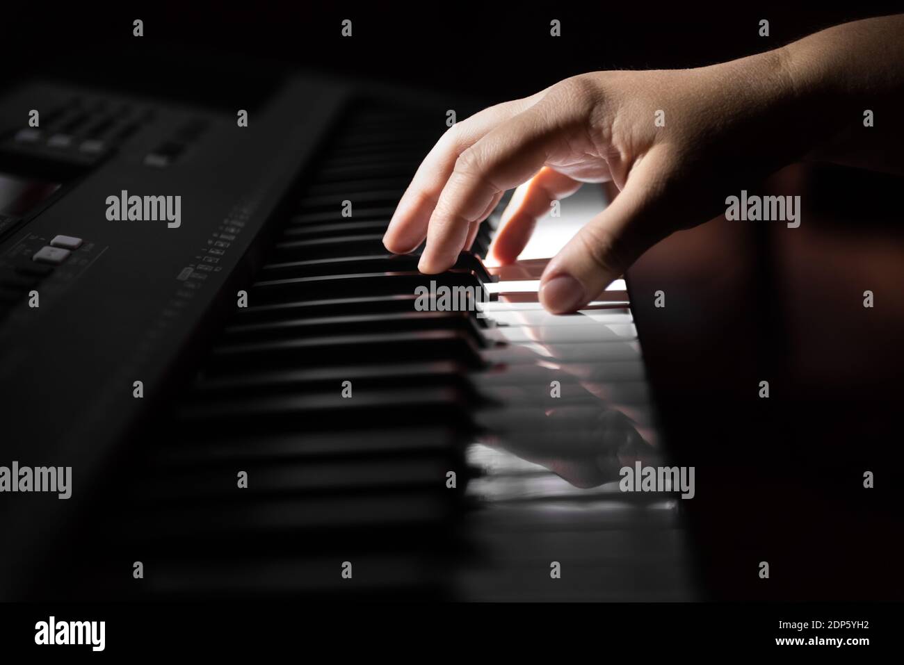 Musician at a concert playing piano Stock Photo - Alamy