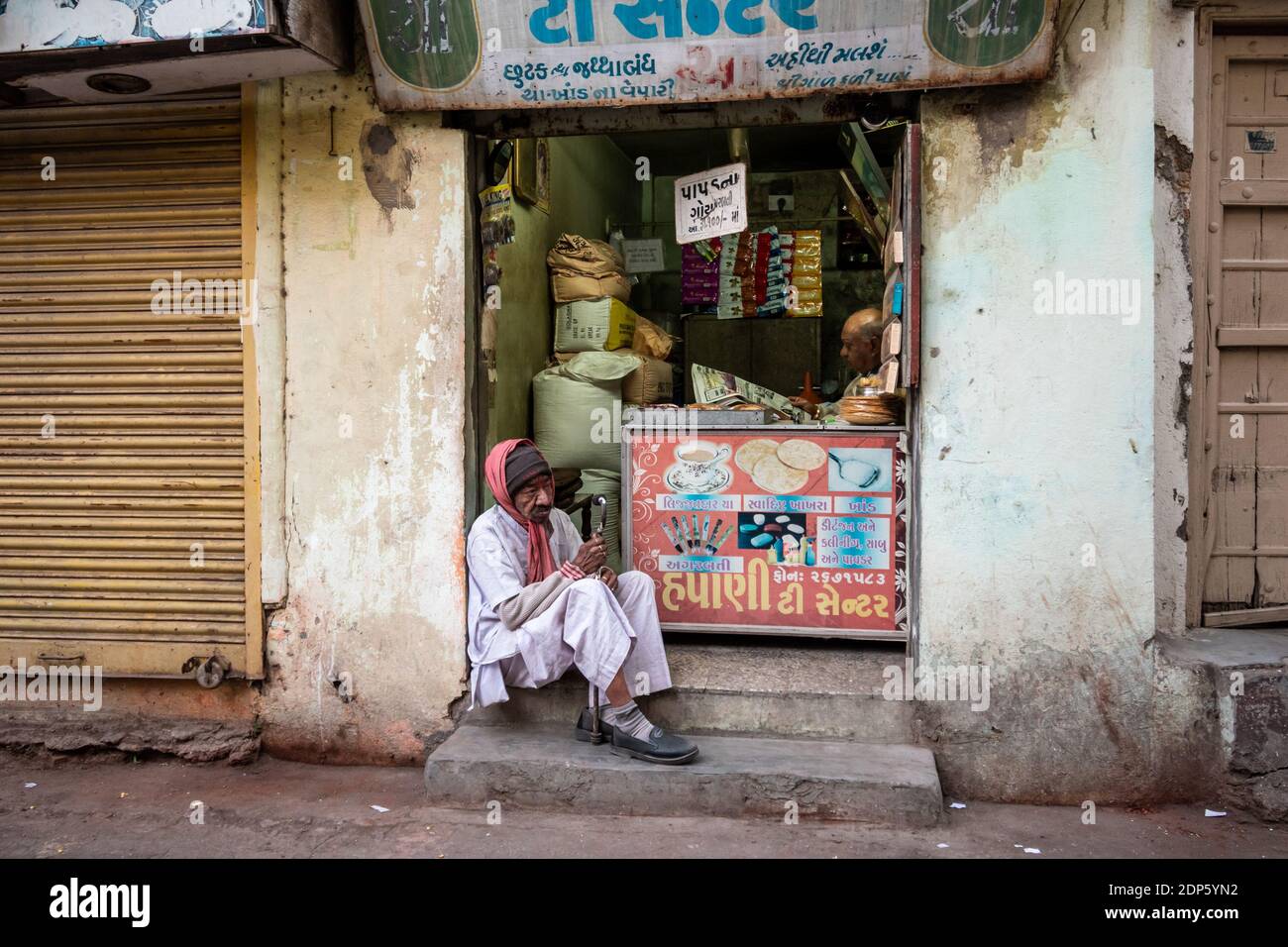 Jamnagar, Gujarat, India - December 2018: An elderly Indian man sitting ...