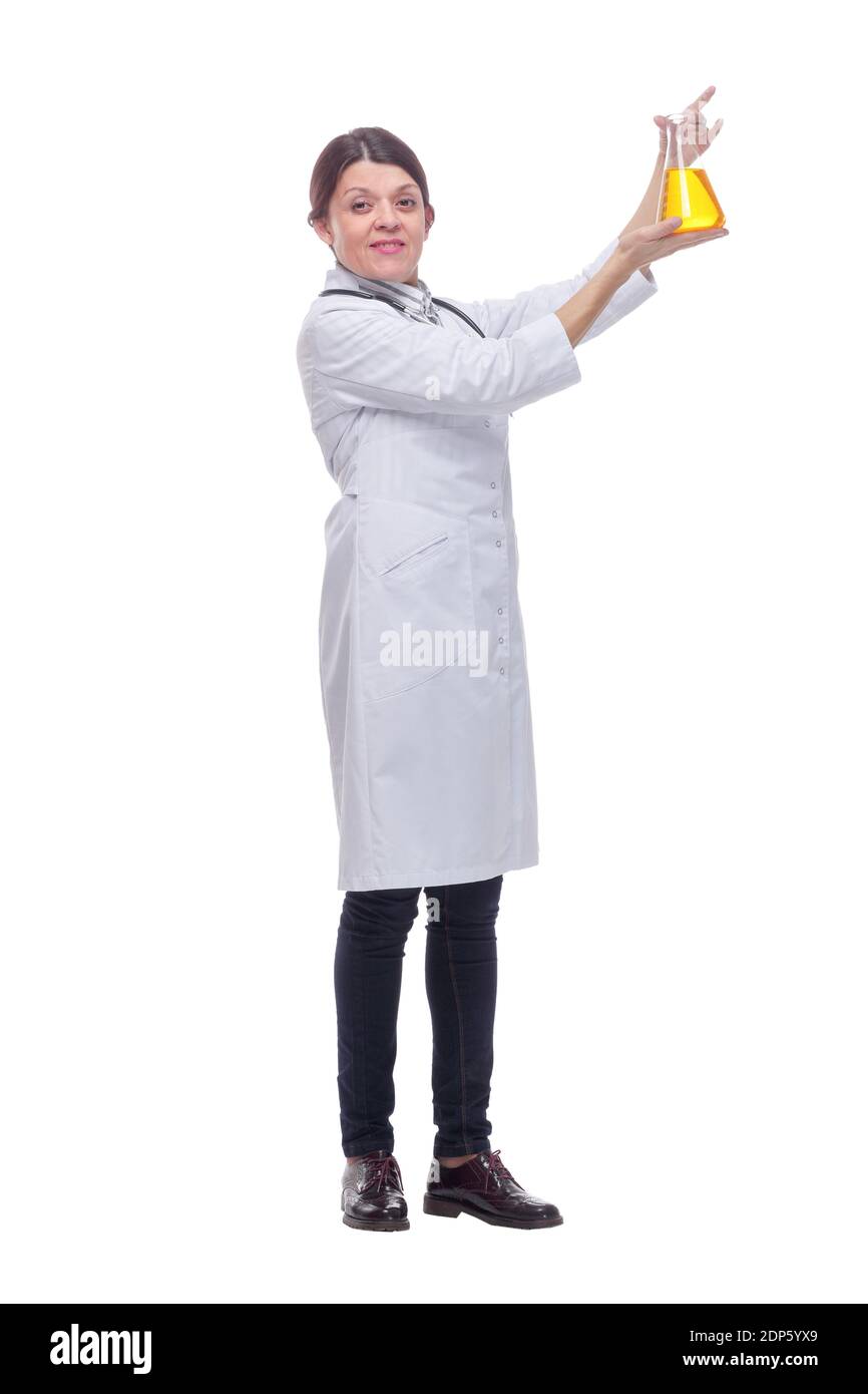 Scientist holding up beaker with of chemical yellow liquid Stock Photo ...