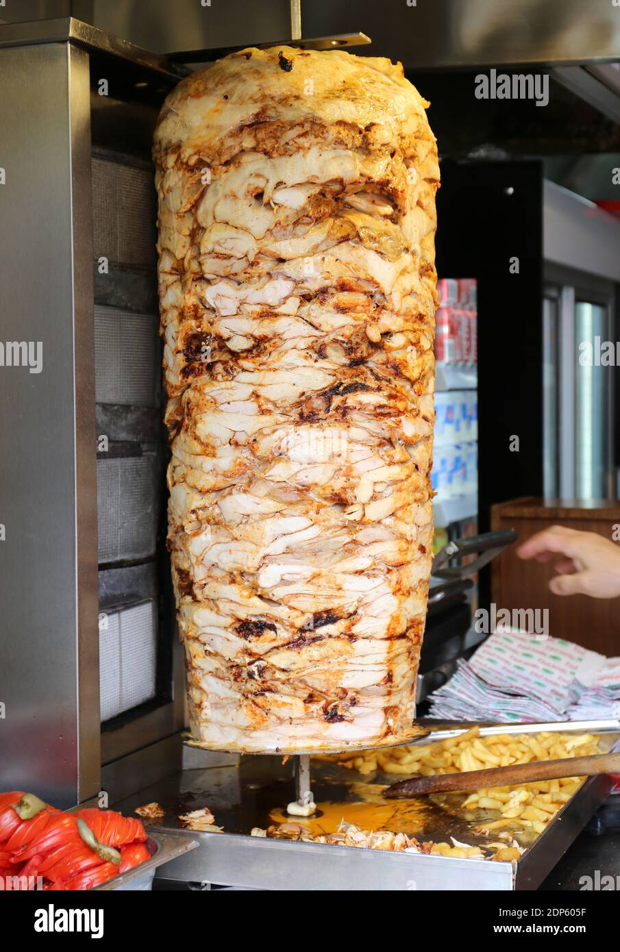 Chef slicing Chicken Doner Kebab at local restaurant in Beyoglu ...