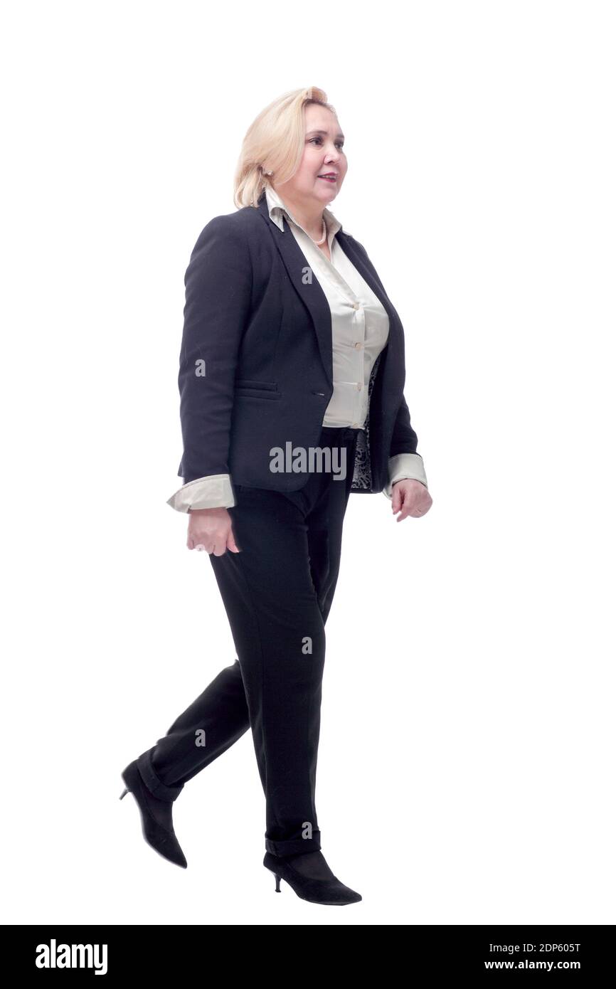 Happy business woman walking towards camera and smiling Stock Photo - Alamy