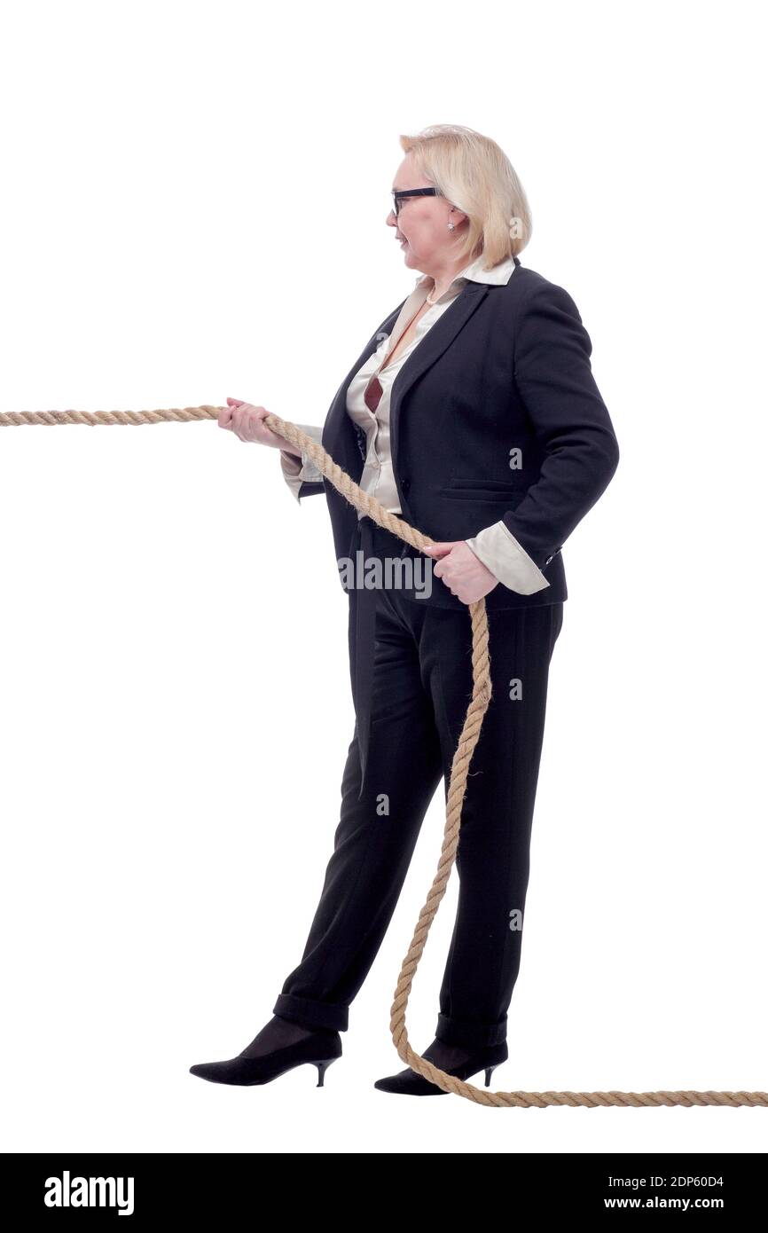 Picture of business woman pulling rope Stock Photo - Alamy