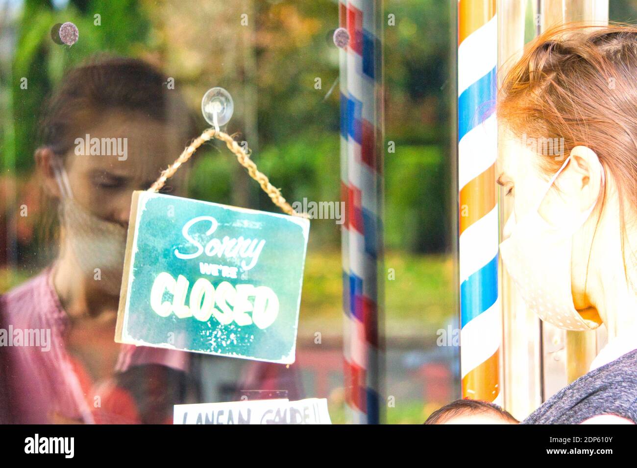 Excuse me, we are closed in business with a woman's reflection ...